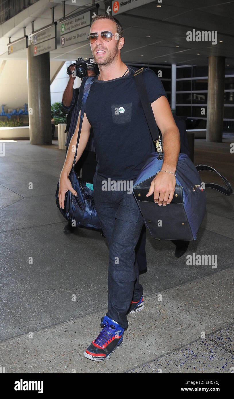 Coldplay frontman Chris Martin arrives at Los Angeles International ...