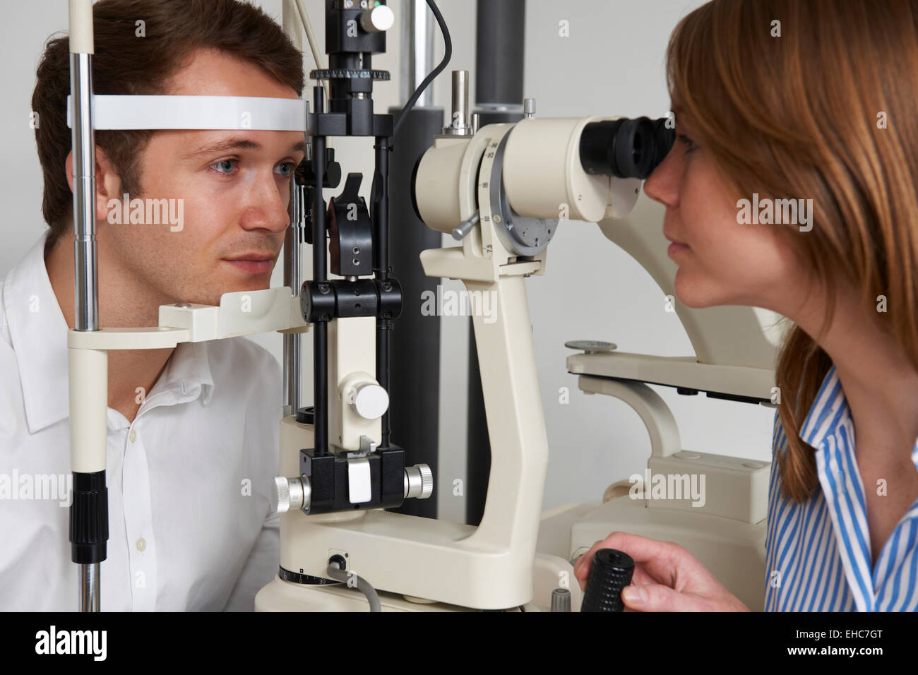 Man Having Sight Test At Optician Stock Photo - Alamy