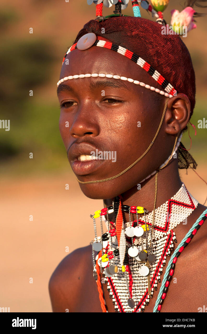 A Samburu Moran (warrior) with beaded necklaces and headdress, South ...
