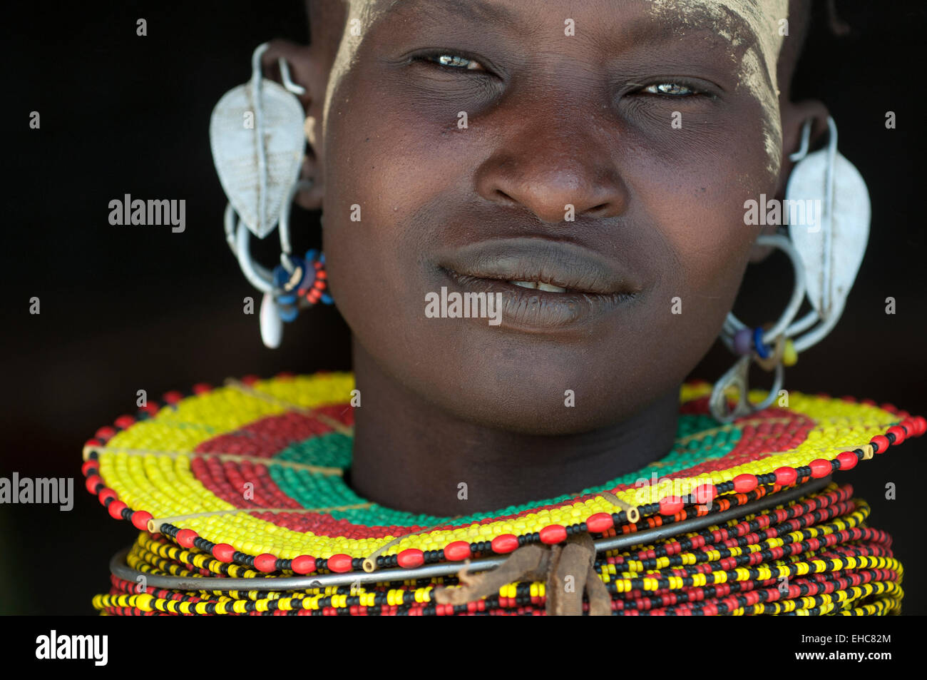 Close-up of a Turkana woman with massive colorful beaded necklaces ...