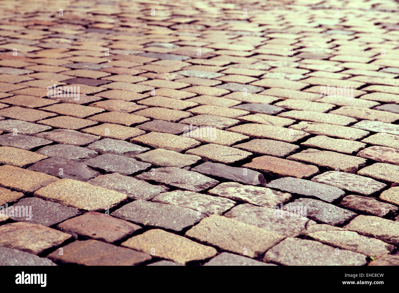 Cobble stone road pattern with vintage effect Stock Photo - Alamy
