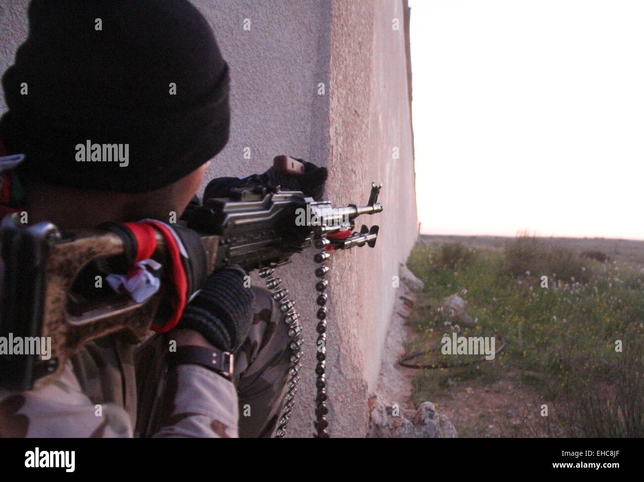 Tripoli. 11th Mar, 2015. A Libya Dawn fighter takes aim near Libya's ...