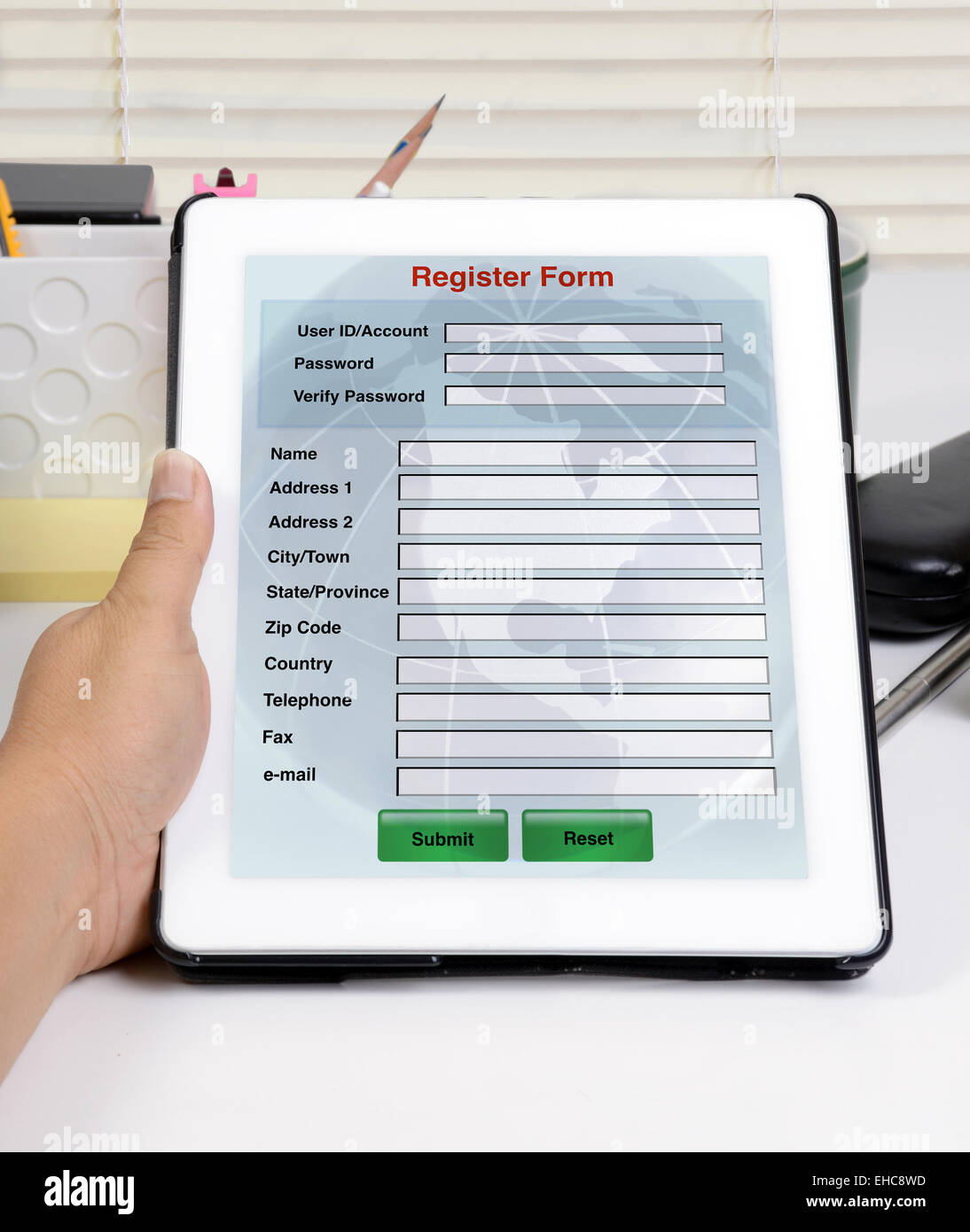 Register form on tablet for on line register Stock Photo - Alamy