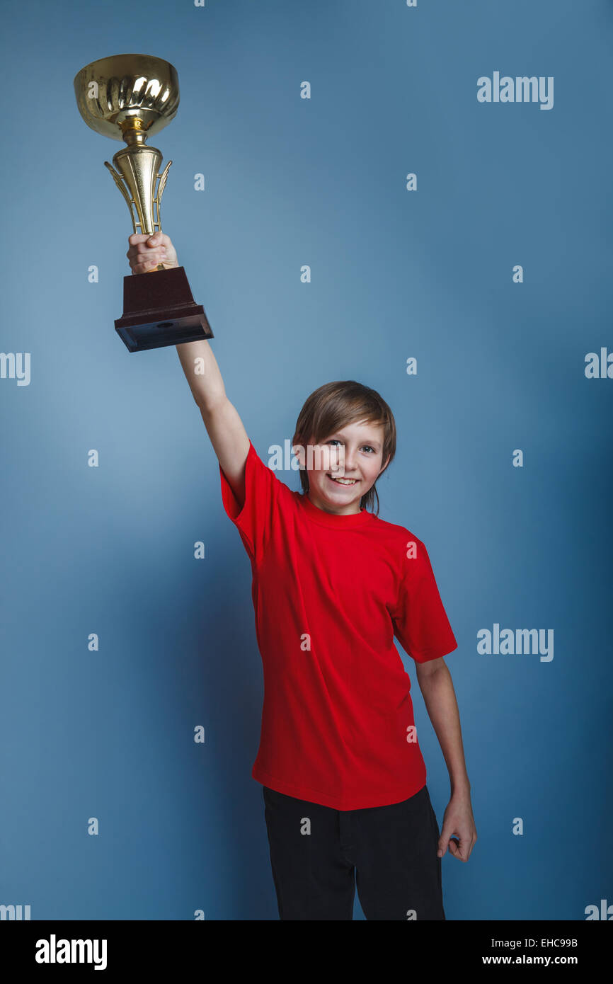 Kids holding trophy hi-res stock photography and images - Alamy