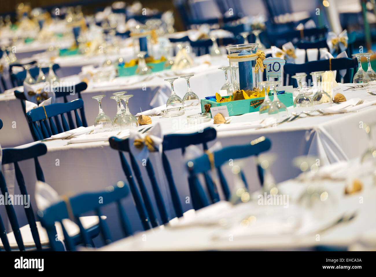Elegant restaurant with blue seats Stock Photo - Alamy
