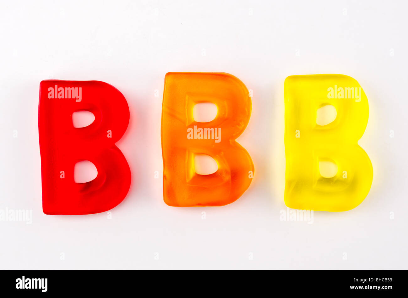 A set of three gummy letters in the shape of B isolated on white Stock ...