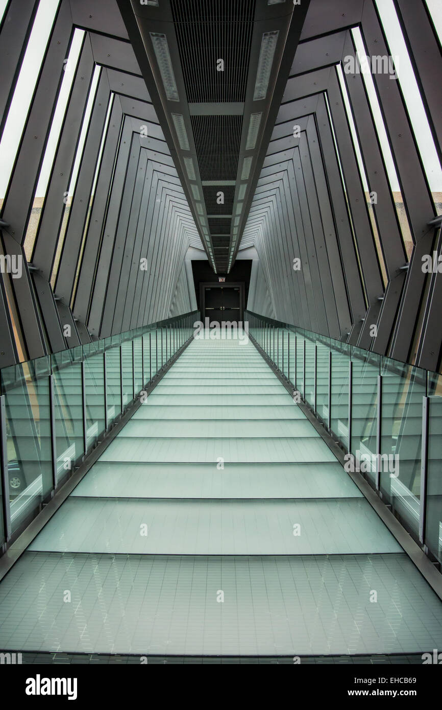 A glass walkway to an exit door Stock Photo - Alamy
