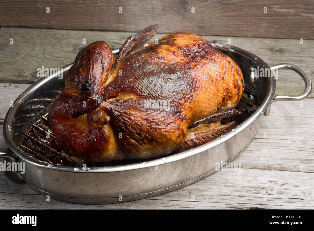 Whole roasted duck with spices and syrup glazed (lacquered) crispy skin ...