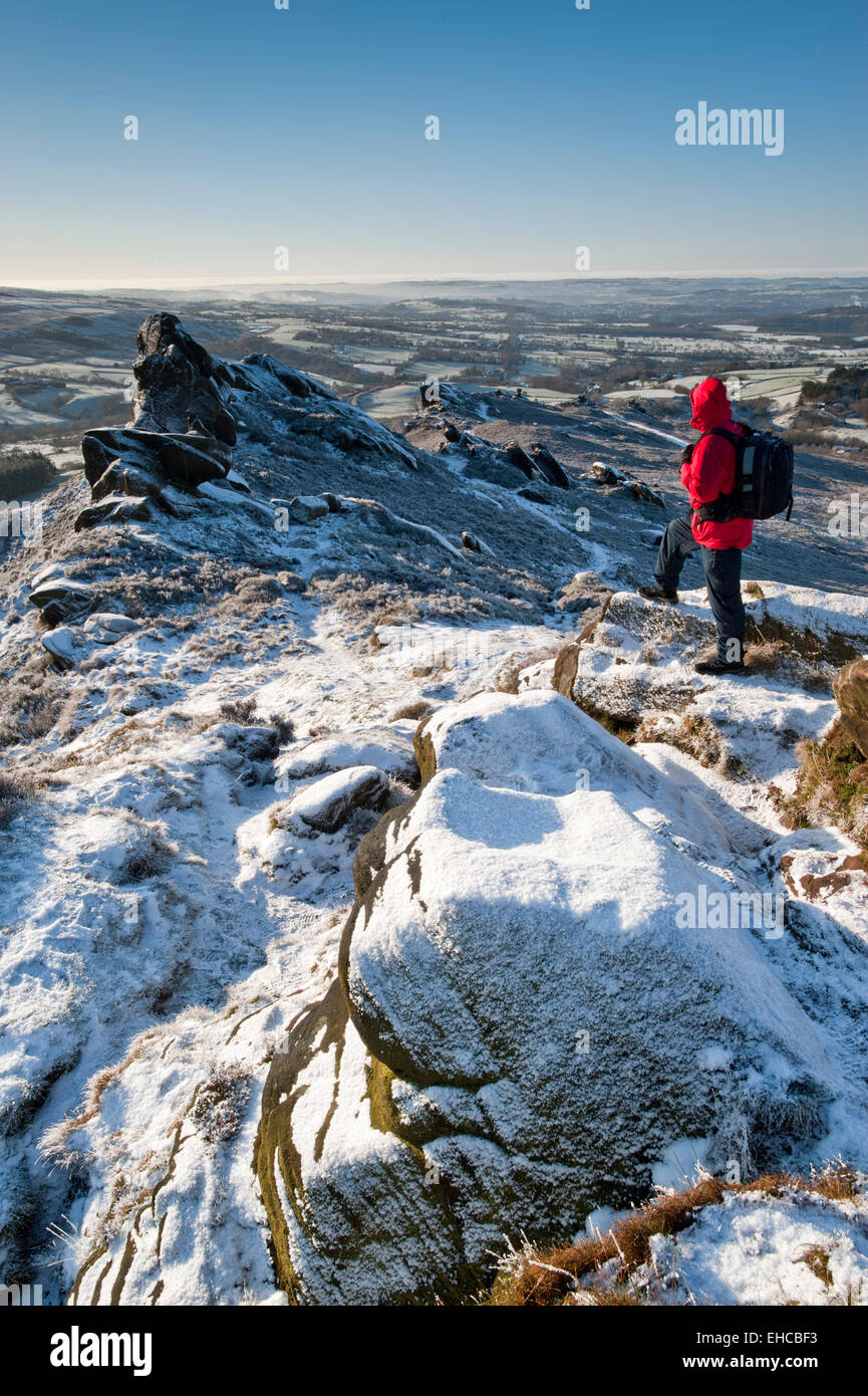 Walker on Ramshaw Rocks in Winter, Peak District National Park ...