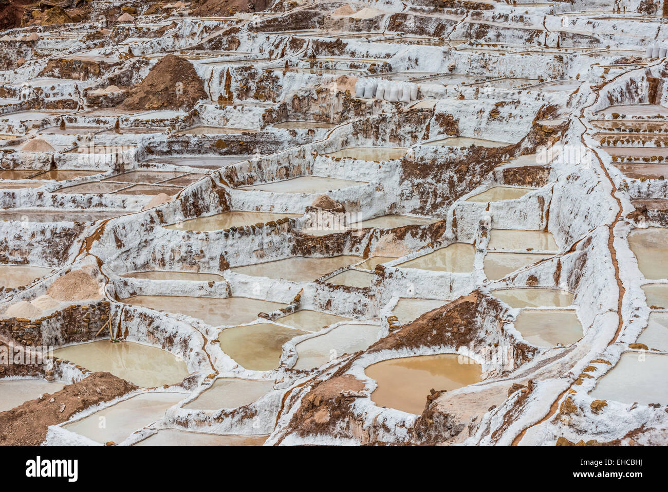 Maras salt mines in the peruvian Andes at Cuzco Peru Stock Photo - Alamy