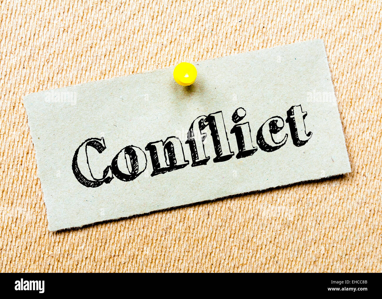 Recycled paper note pinned on cork board. Conflict Message. Concept ...