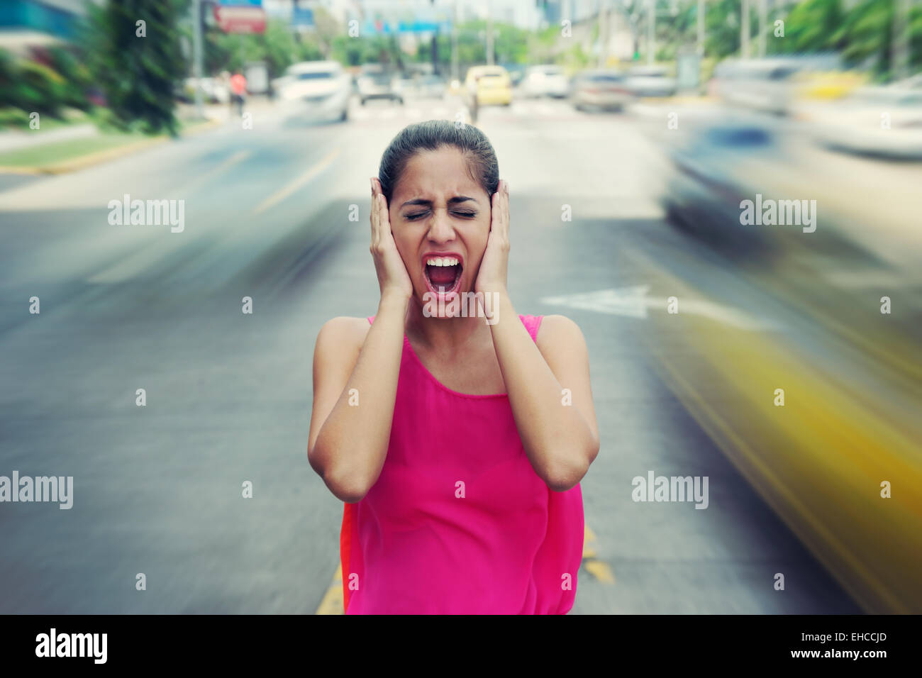Road noise covering ears hi-res stock photography and images - Alamy