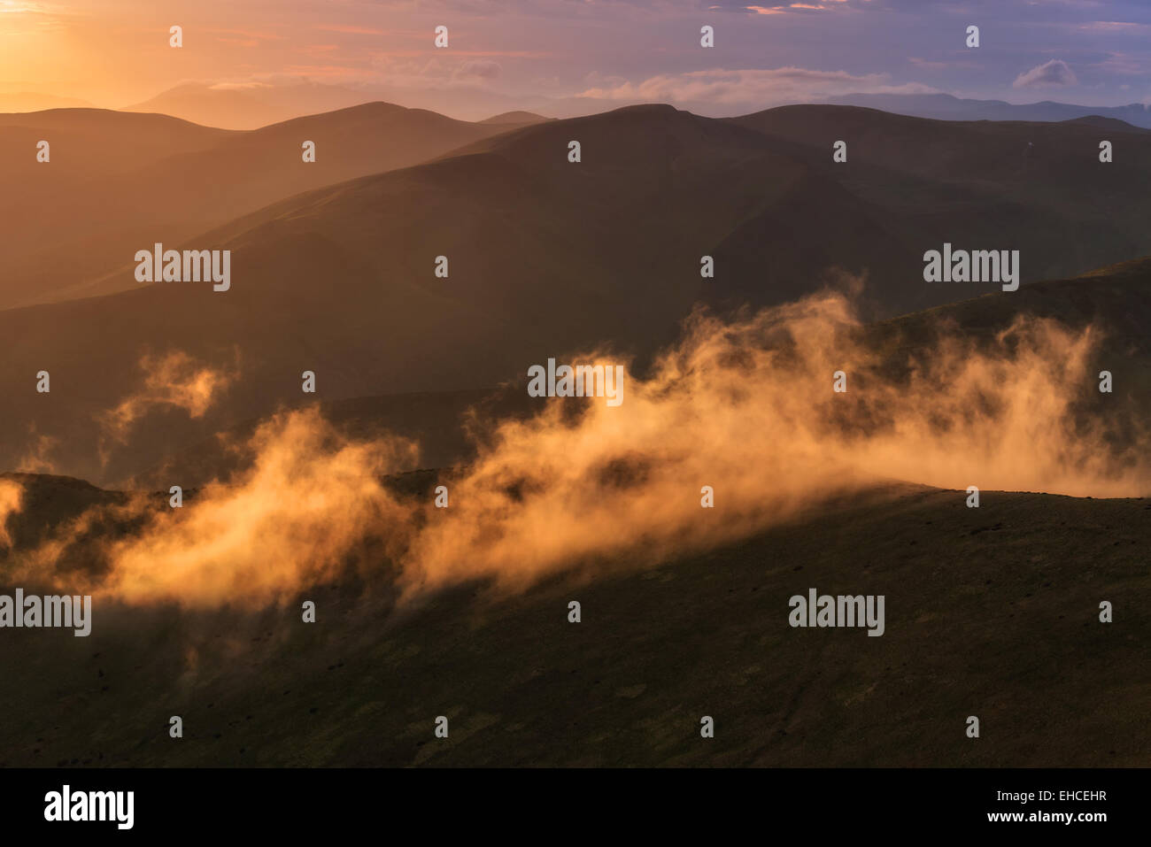 beauty sunset on high mountain Stock Photo - Alamy