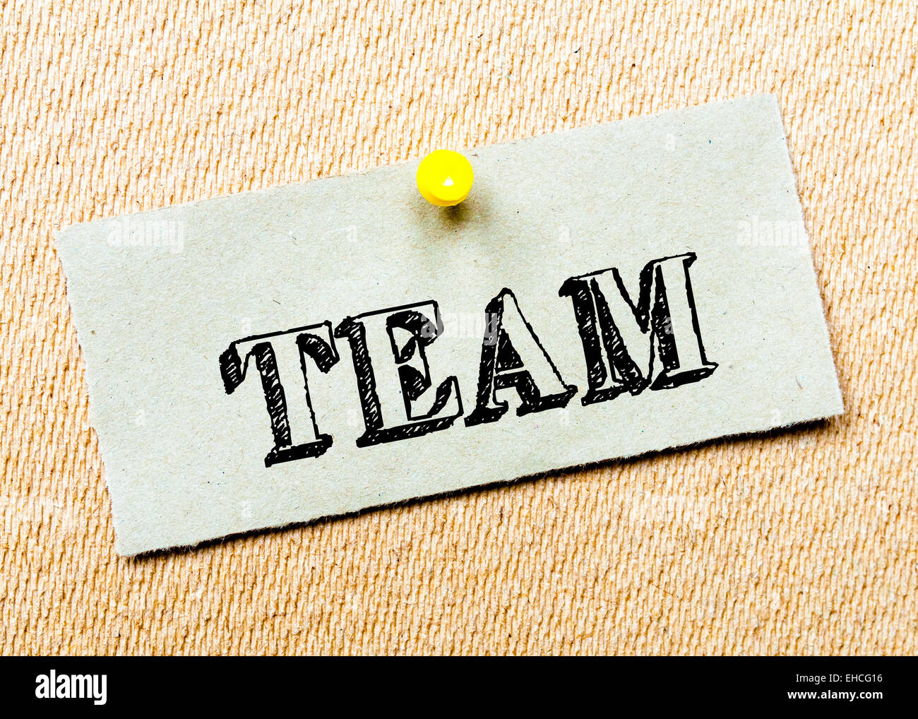 Recycled paper note pinned on cork board. Team Message. Concept Image ...