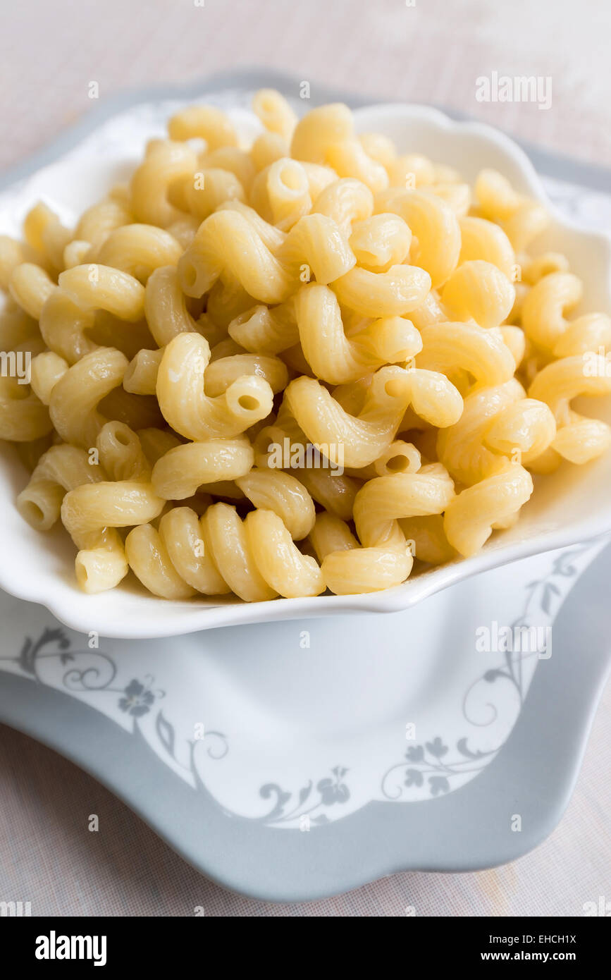 Boiled the pasta in a bowl on table Stock Photo - Alamy