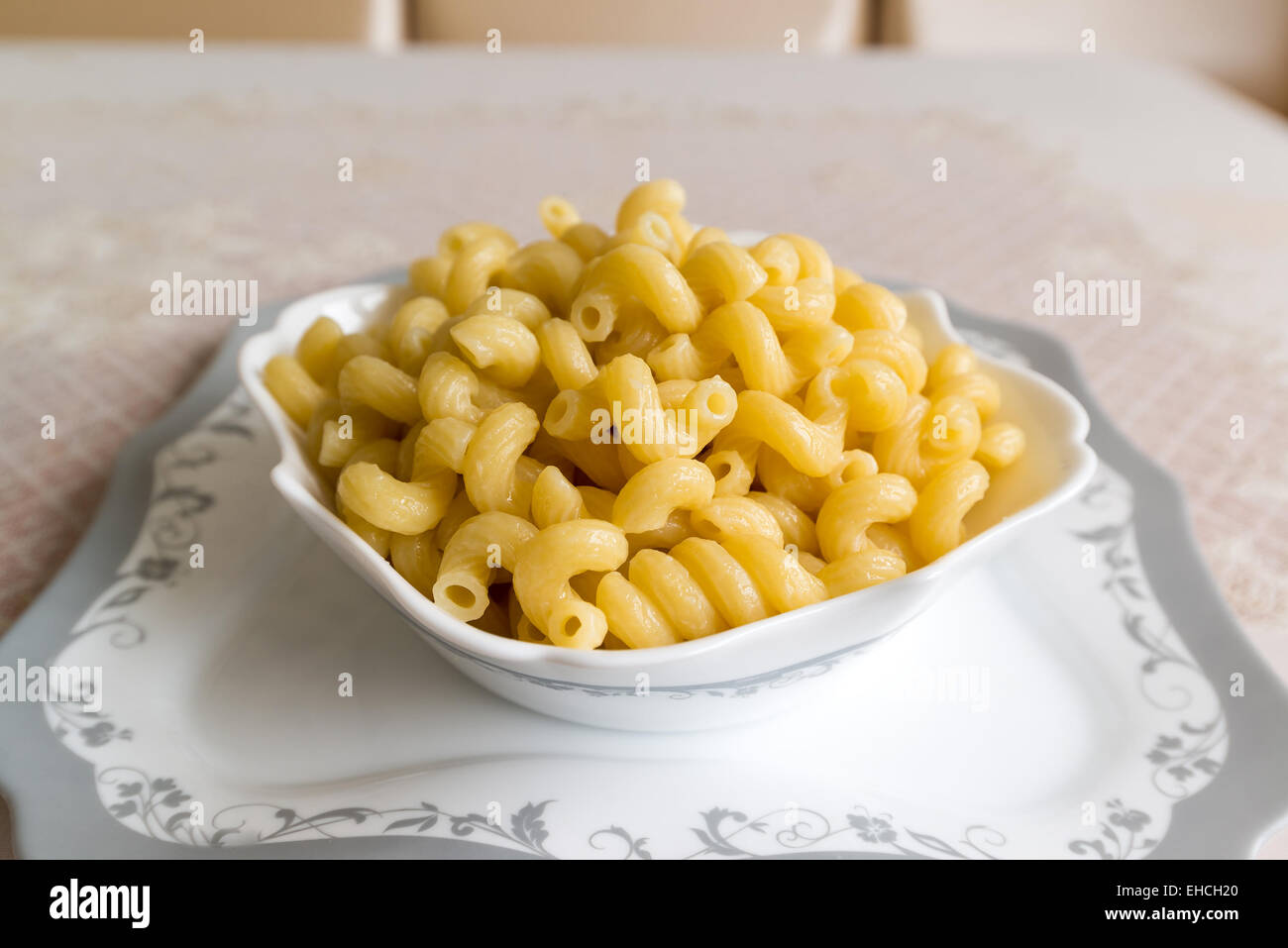 Boiled the pasta in a bowl on table Stock Photo - Alamy