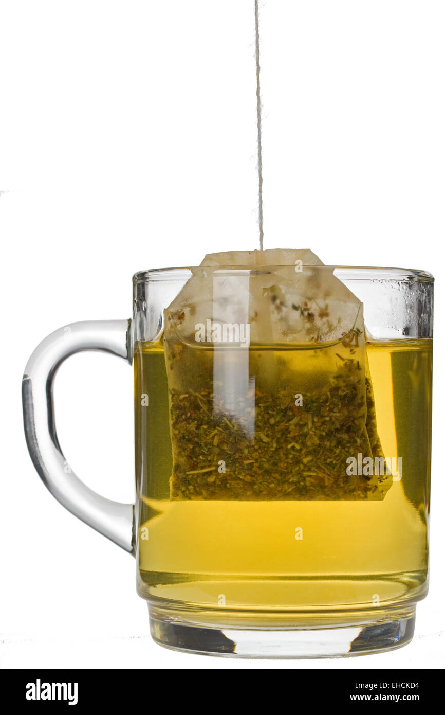glass of herbal tea isolated on white Stock Photo - Alamy