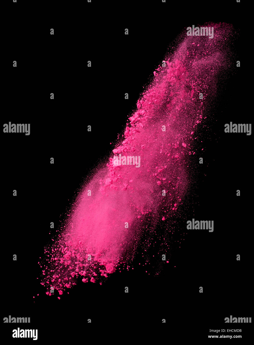 Freeze motion of pink dust explosion isolated on black Stock Photo - Alamy