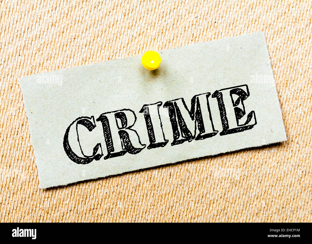 Recycled paper note pinned on cork board. Crime Message. Concept Image ...