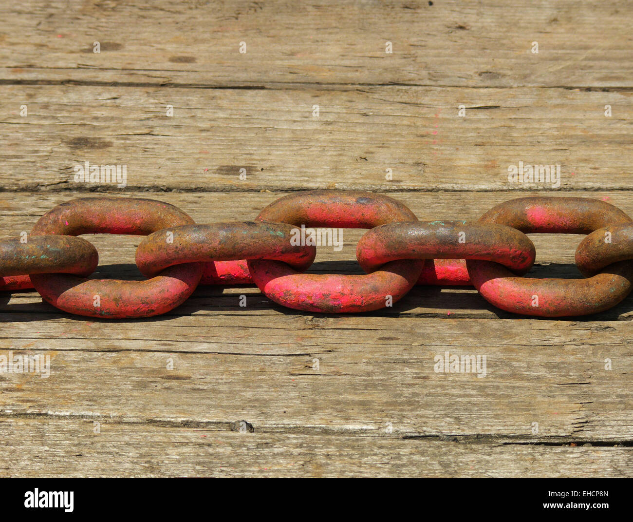 Three pink chain links Stock Photo - Alamy