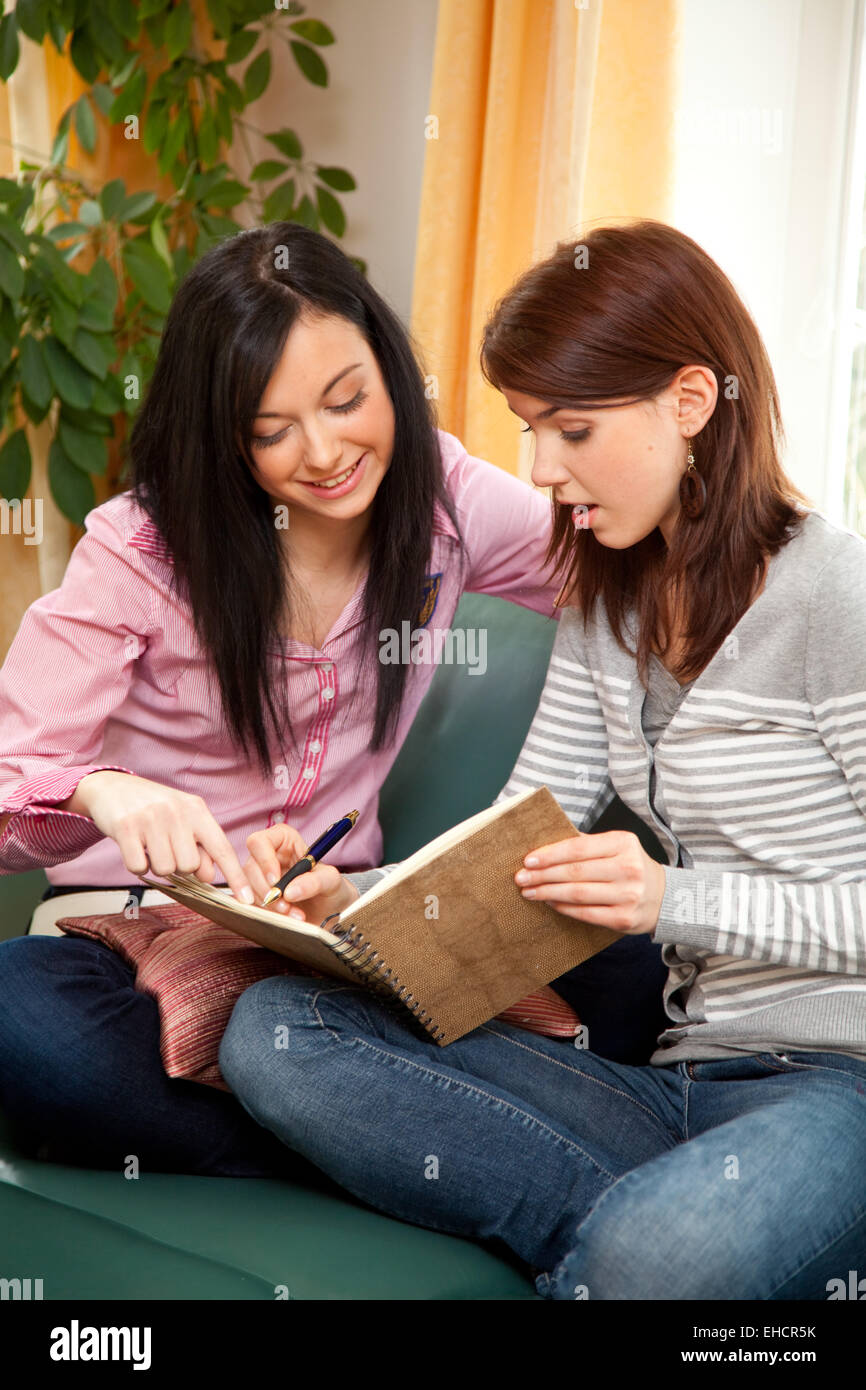 Women write diary Stock Photo - Alamy