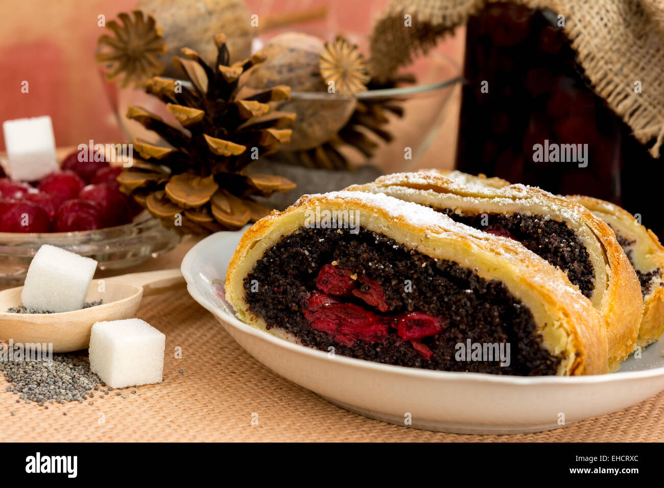Poppy seed strudel with cherry Stock Photo - Alamy