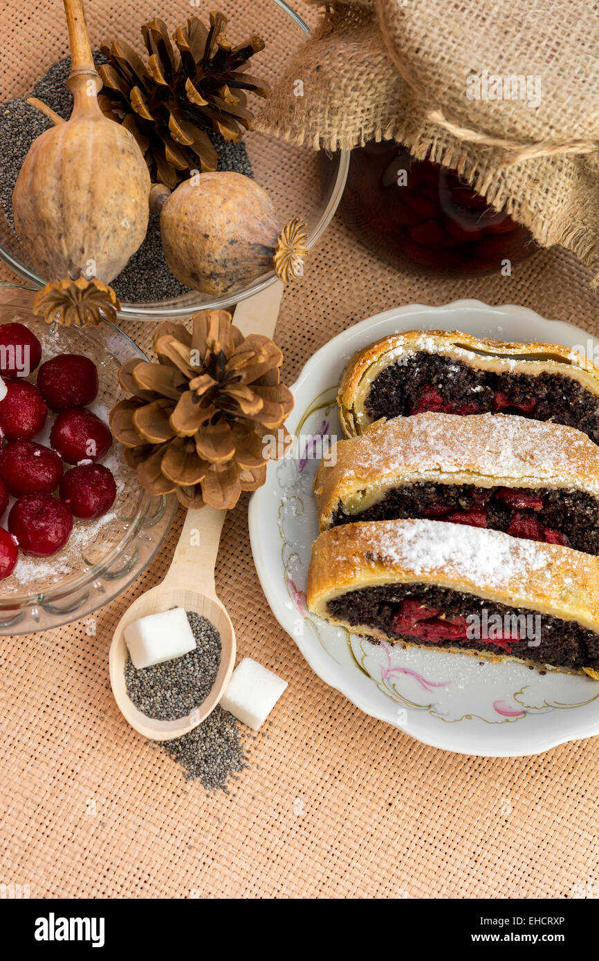 Poppy seed strudel with cherry Stock Photo - Alamy