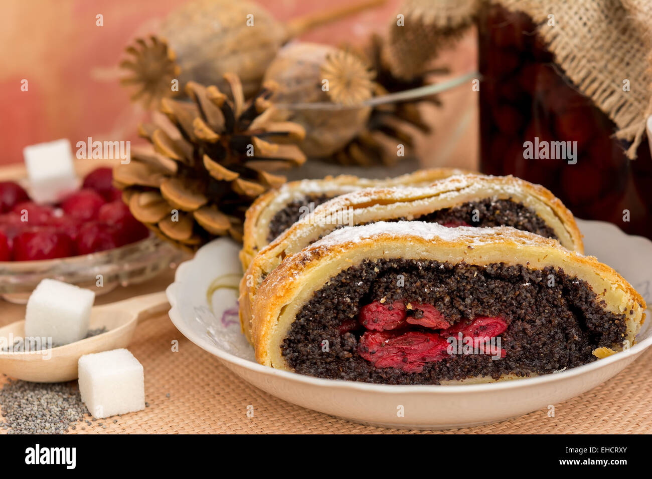 Poppy seed strudel with cherry Stock Photo - Alamy