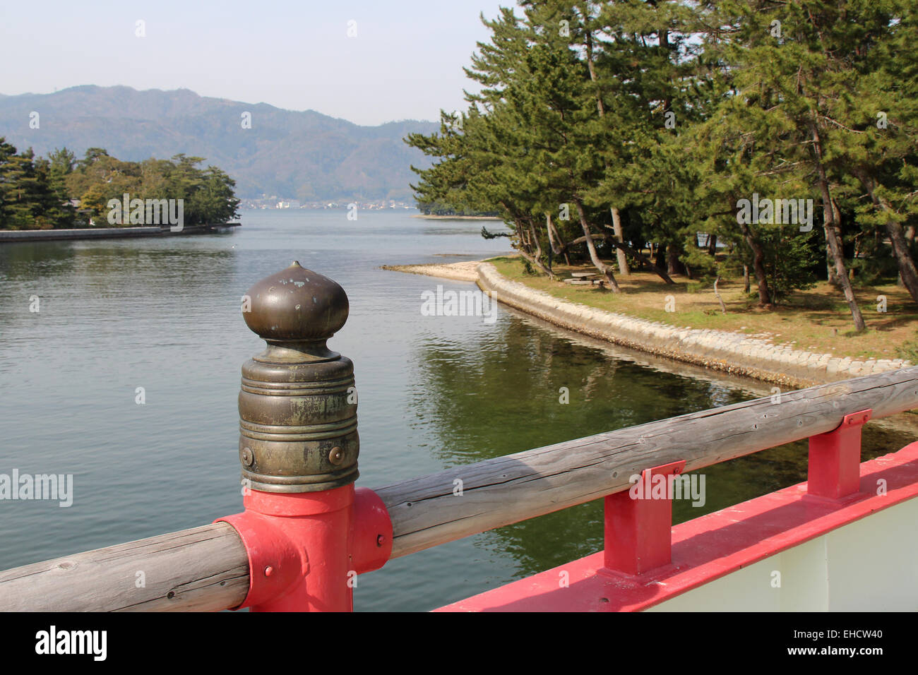 The rail of a bridge built in Amanohashidate, Japan, was painted in red ...