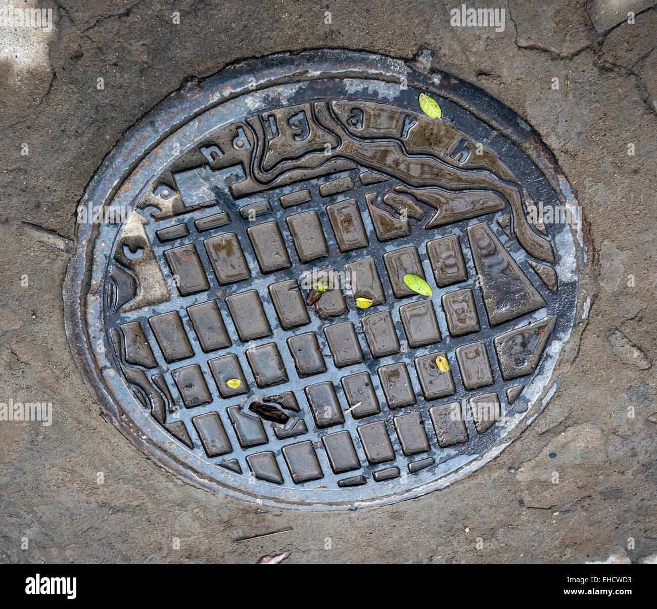 Cast iron manhole cover hi-res stock photography and images - Alamy