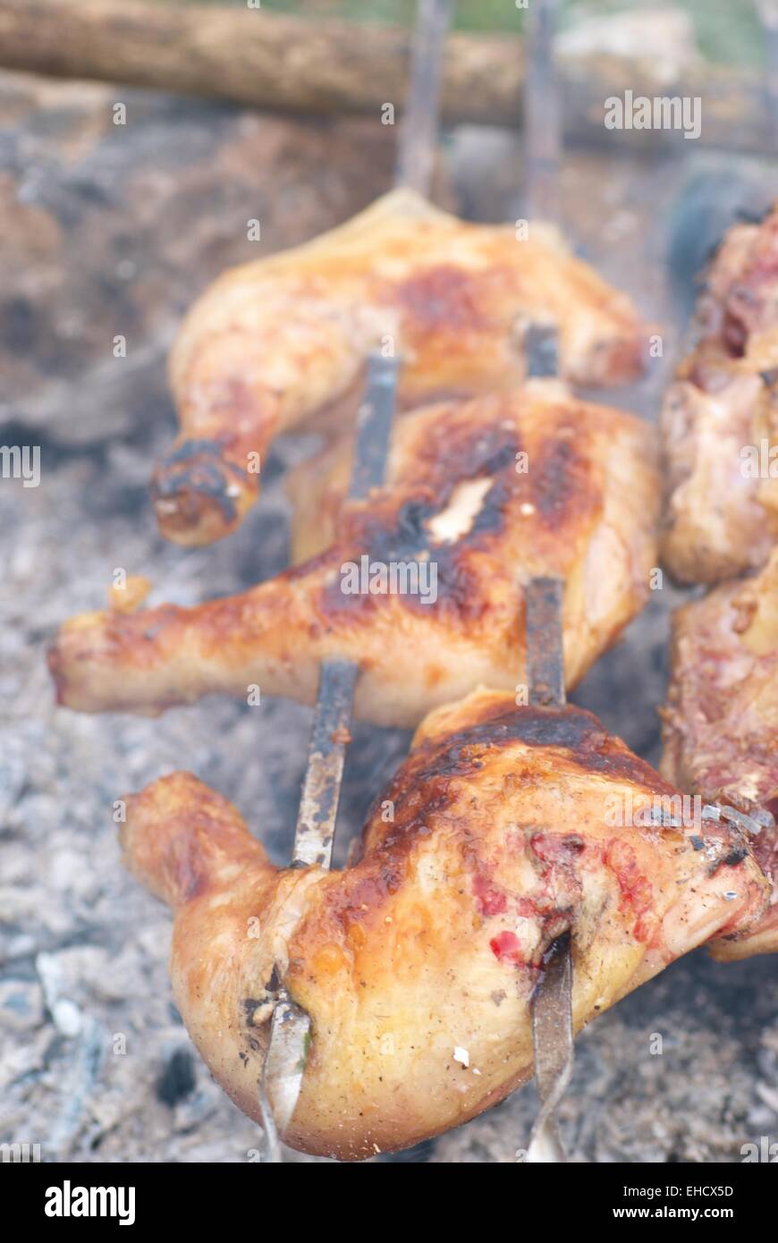 Appetizing grilled chiken kebab on metal skewers Stock Photo - Alamy