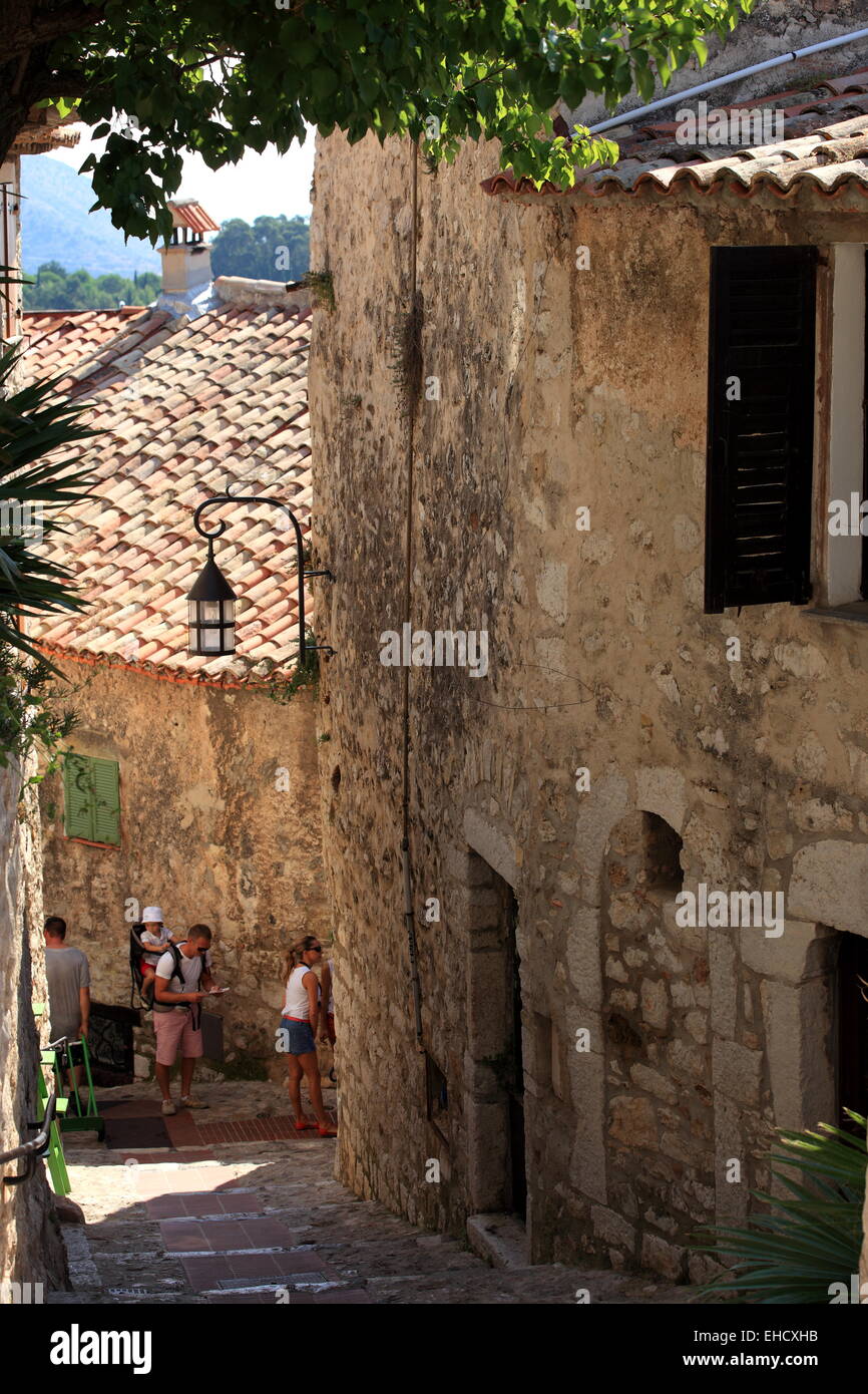 Street scene and tourism spotlight in the medieval village of Eze Stock ...