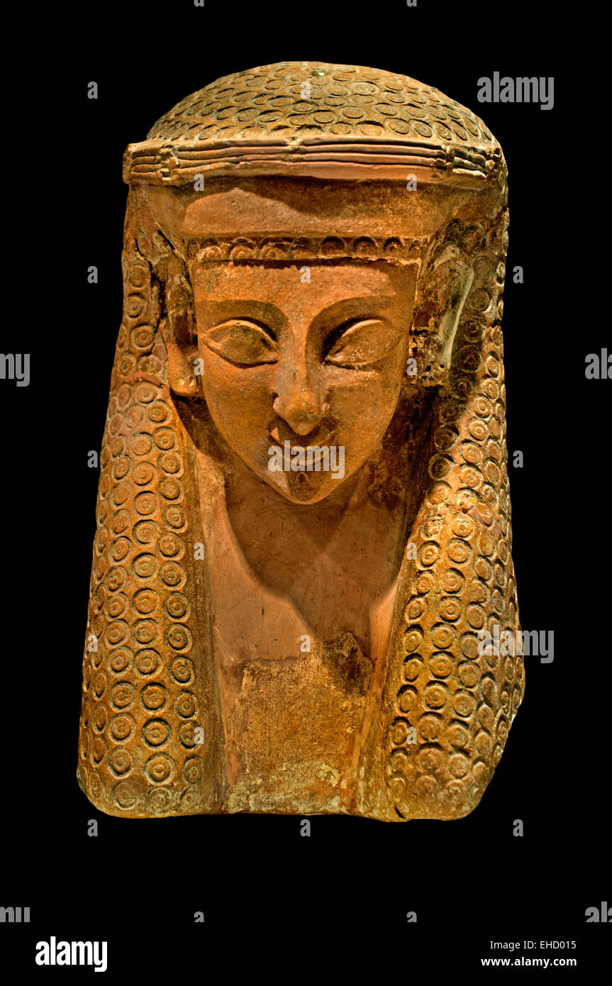 This mask known as a protome mask , clearly combines Egyptian influence ...