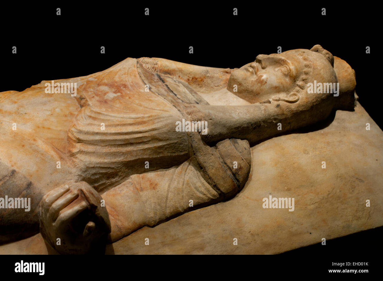 The female figure on this sarcophagus lid holds an incense jar in one ...