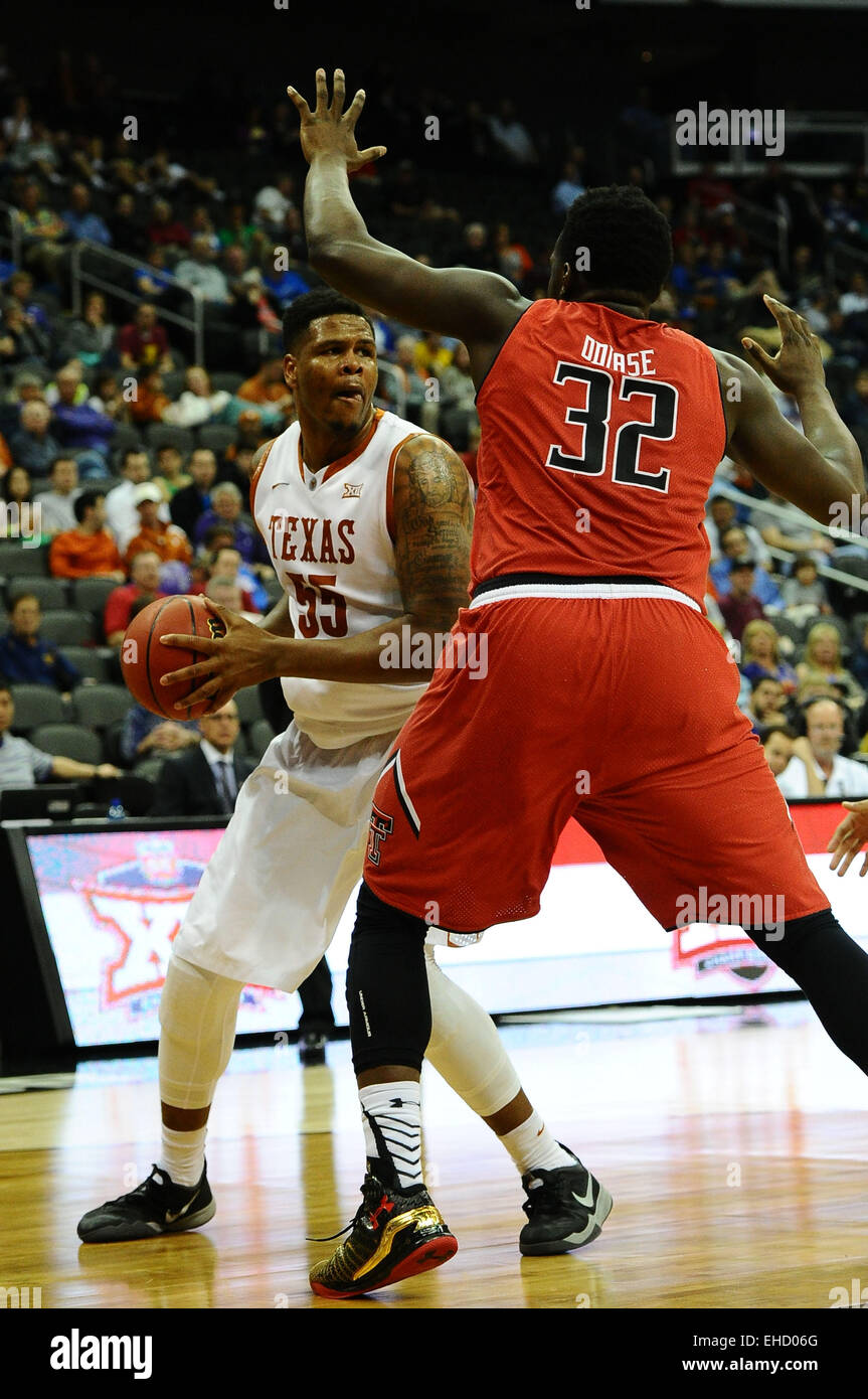 March 11,2015: Texas Longhorns center Cameron Ridley (55) looks to pass ...