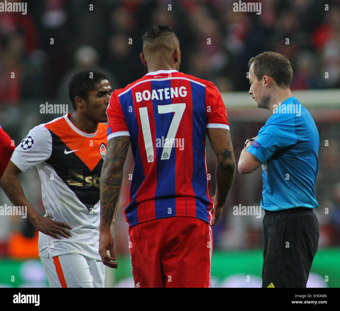 Munich, Germany. 11th Mar, 2015. Referee William Collum gives Shaktar's ...