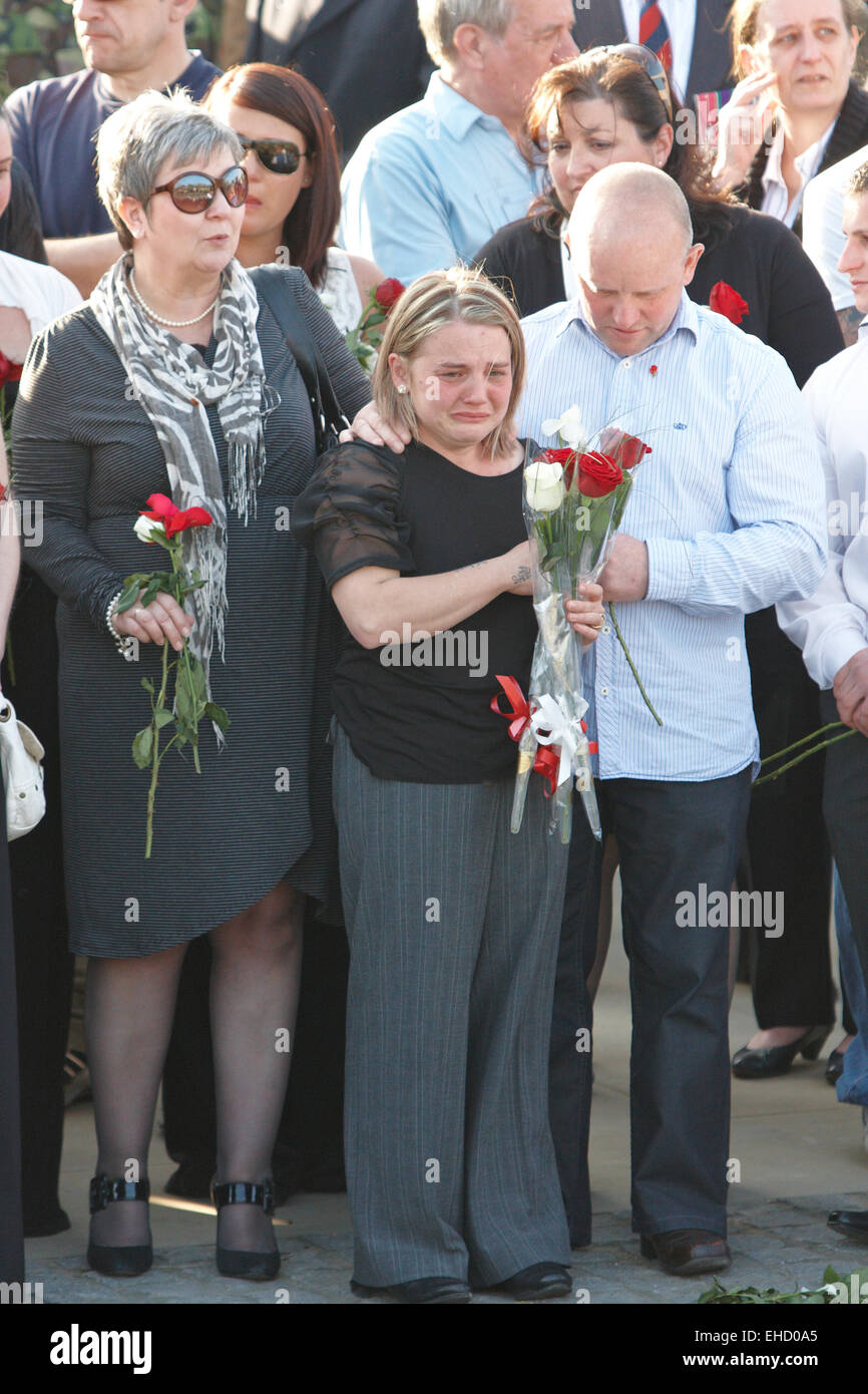 Friends and family of L/Cpl Michael Foley pay their respects during the ...