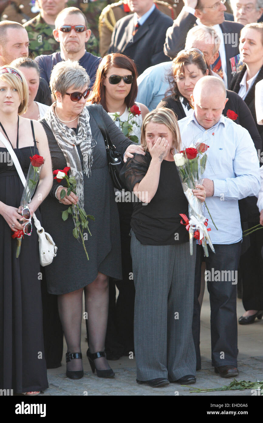 Friends and family of L/Cpl Michael Foley pay their respects during the ...