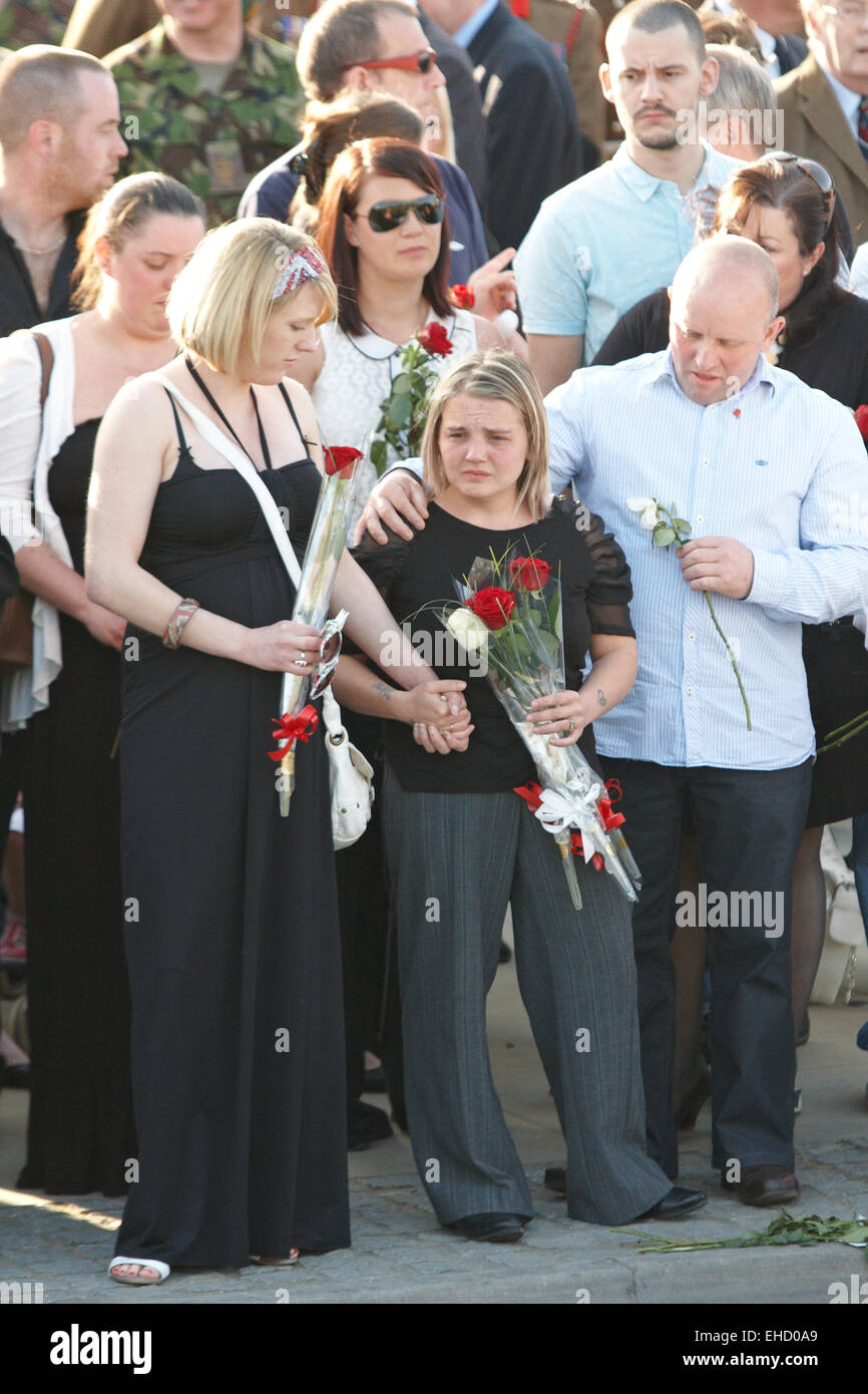 Friends and family of L/Cpl Michael Foley pay their respects during the ...