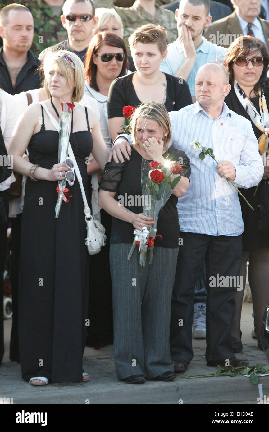 Friends and family of L/Cpl Michael Foley pay their respects during the ...