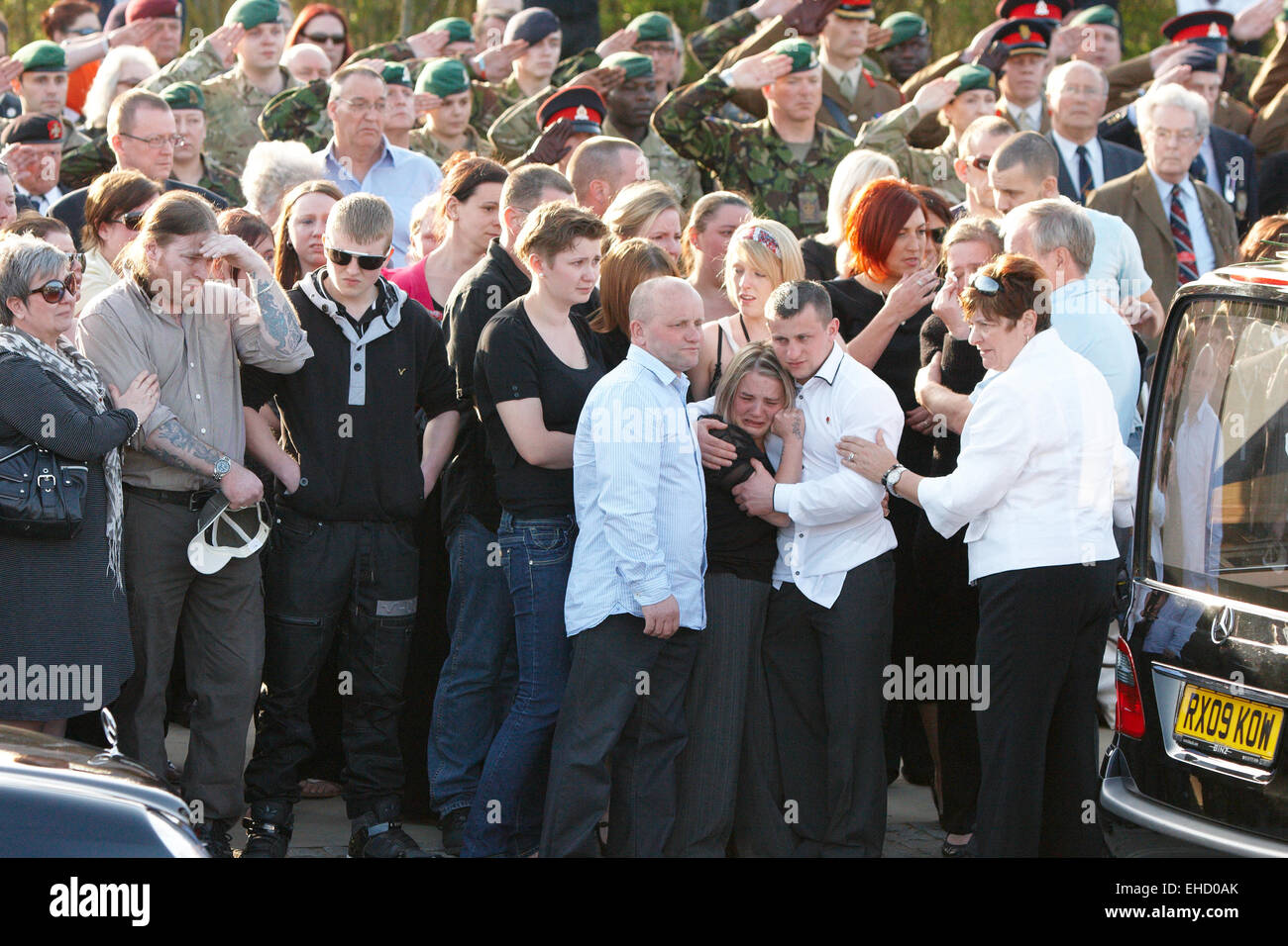 Friends and family of L/Cpl Michael Foley pay their respects during the ...