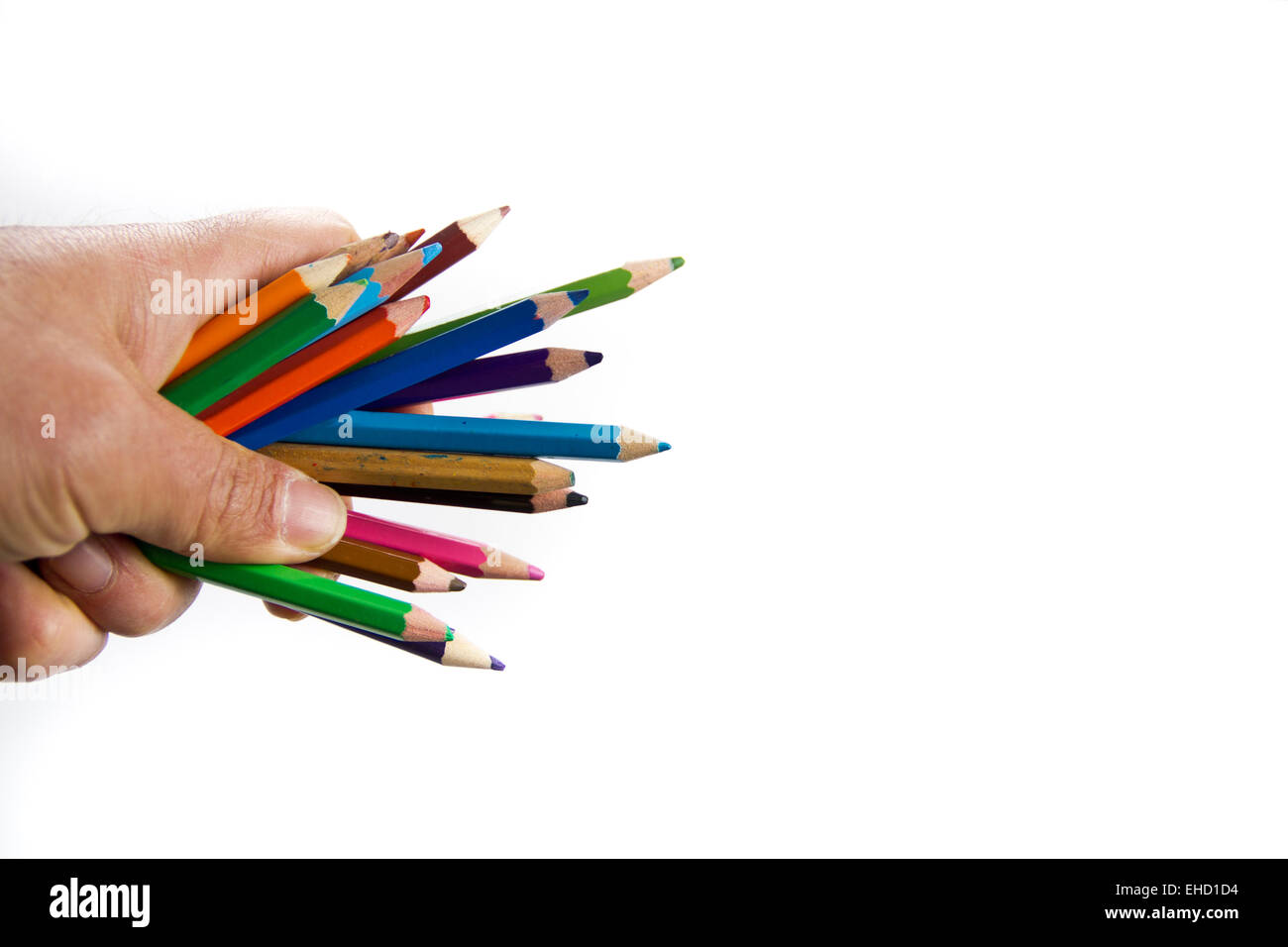 hand holding colorful pencils isolated on white background Stock Photo ...