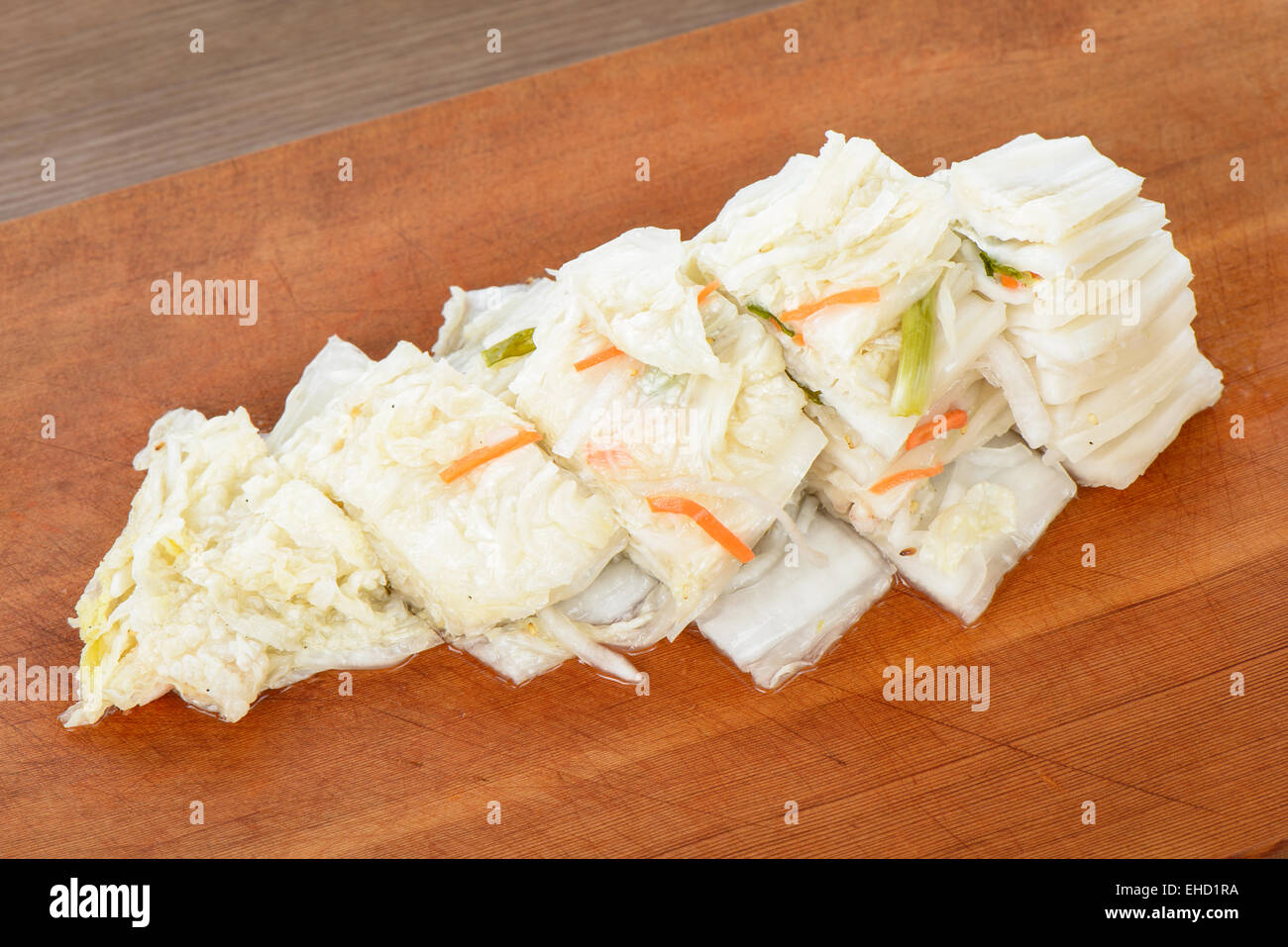 cutted Baek-gimchi on a wooden plate, Korean traditional food Stock ...