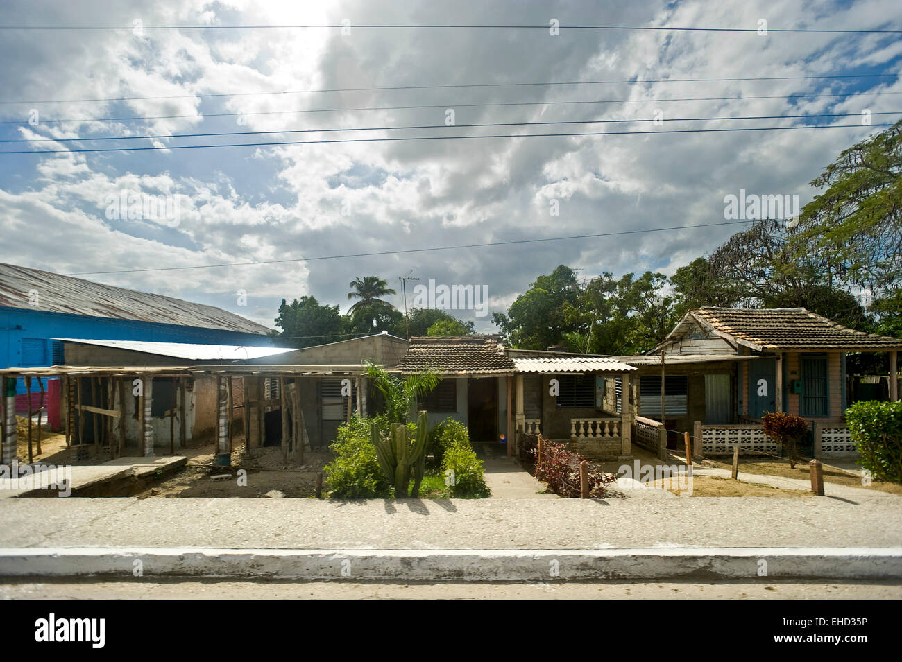 Horizontal view of typical family homes in Cuba Stock Photo - Alamy