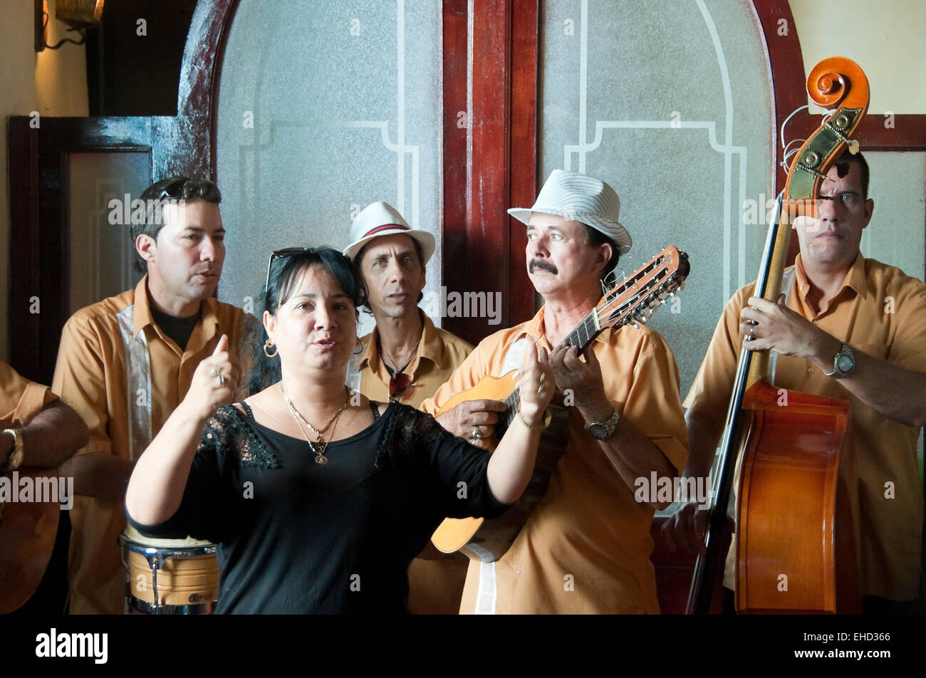 Horizontal view of a salsa group playing in a cafe in Cuba Stock Photo ...
