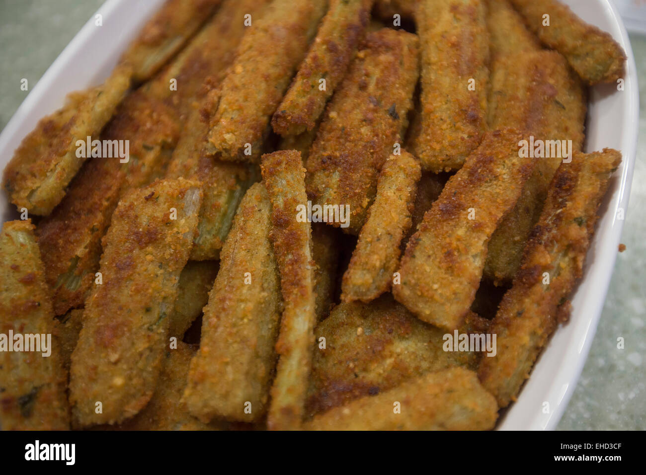 Rosaria Pagano Mauro cooks fried cardoons, a traditional Sicilian ...