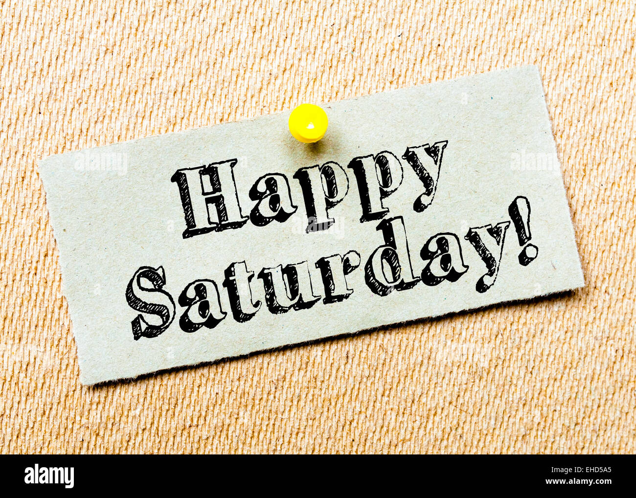 Recycled paper note pinned on cork board. Happy Saturday Message ...