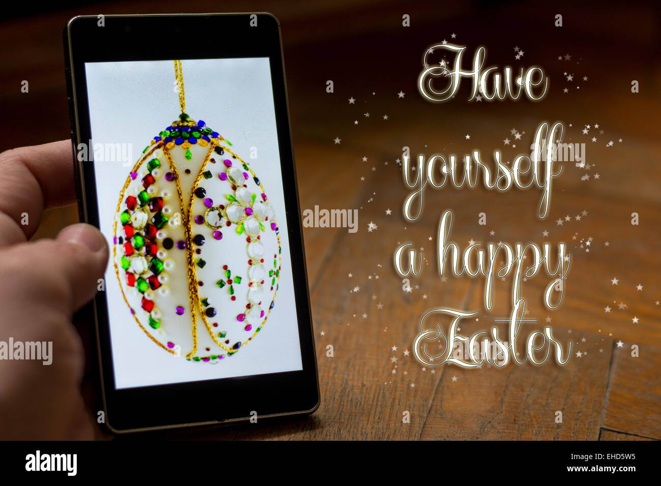 Easter greetings on smart phone with text effect Stock Photo - Alamy