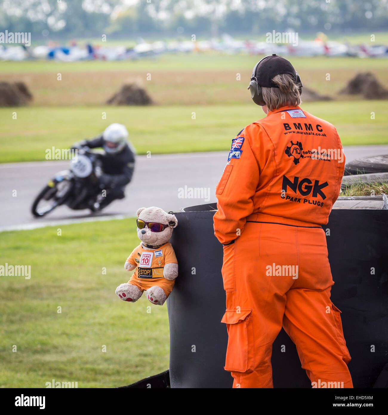 A track marshal watches the Barry Sheen Memorial race at the 2014 ...