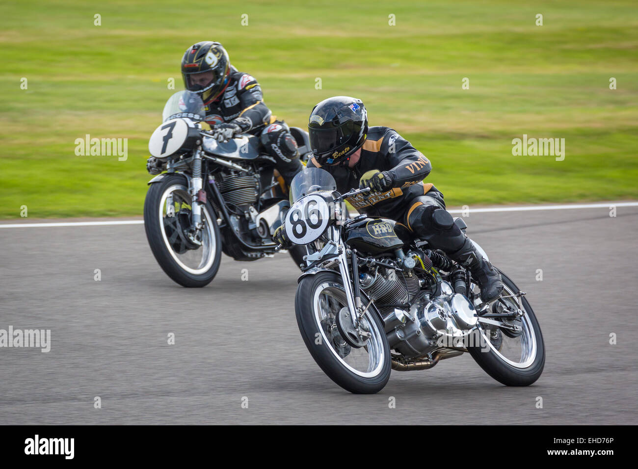 Beau Beaton on the 1950 Vincent Rapide slide past the 1953 Manx Norton ...